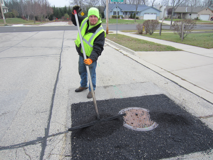 Manhole Asphalt Repair Covering 1 | MudTech Midwest Concrete Repair ...