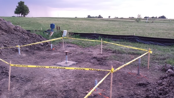 Helical Test Pile Setup | MudTech Midwest Concrete Repair - Mud Jacking
